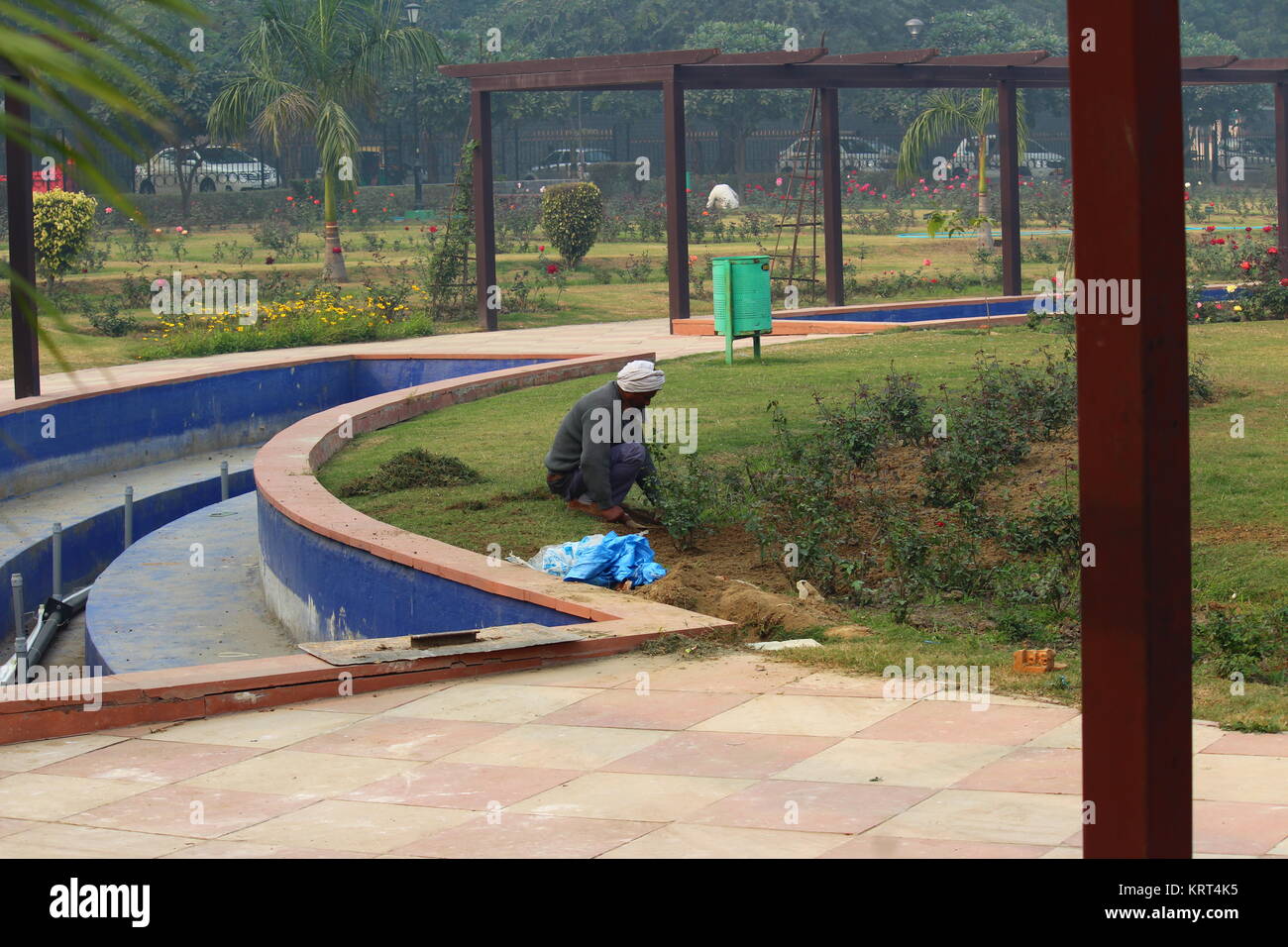 Male Indian Gardener in National Rose Garden, New Delhi Stock Photo - Alamy