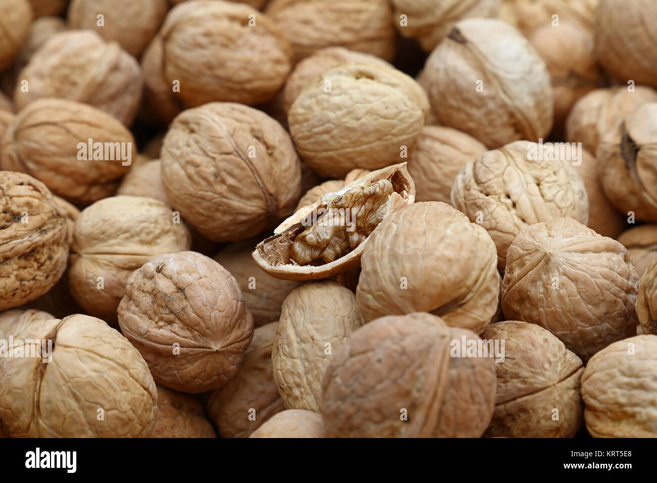 Whole walnuts in nutshells hi-res stock photography and images - Alamy