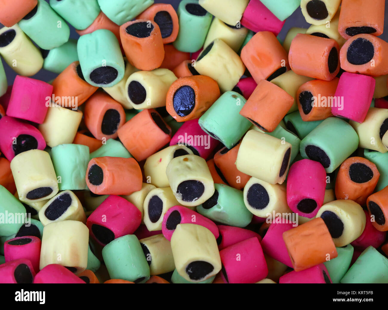Mix of assorted colorful licorice candies Stock Photo - Alamy