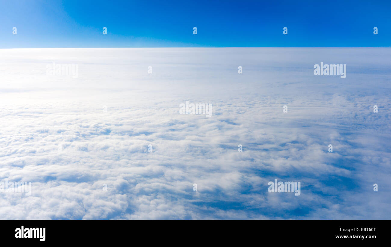 clouds from airplane window. height of 10 000 km. Clouds Stock Photo ...