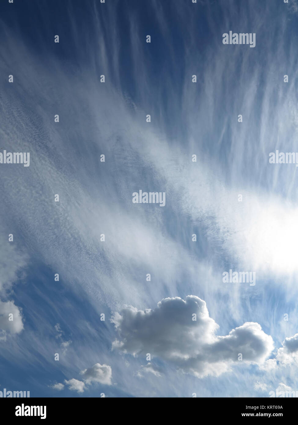 Wind-blown clouds in the sky Stock Photo - Alamy