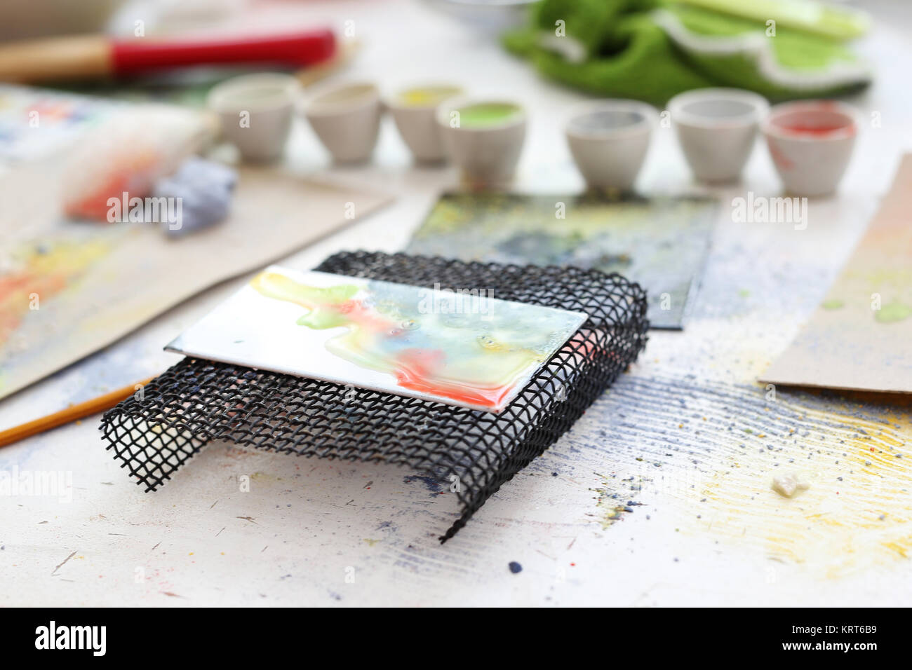 laboratory ceramics,painting on board ceramicznej.malowanie tiles Stock ...