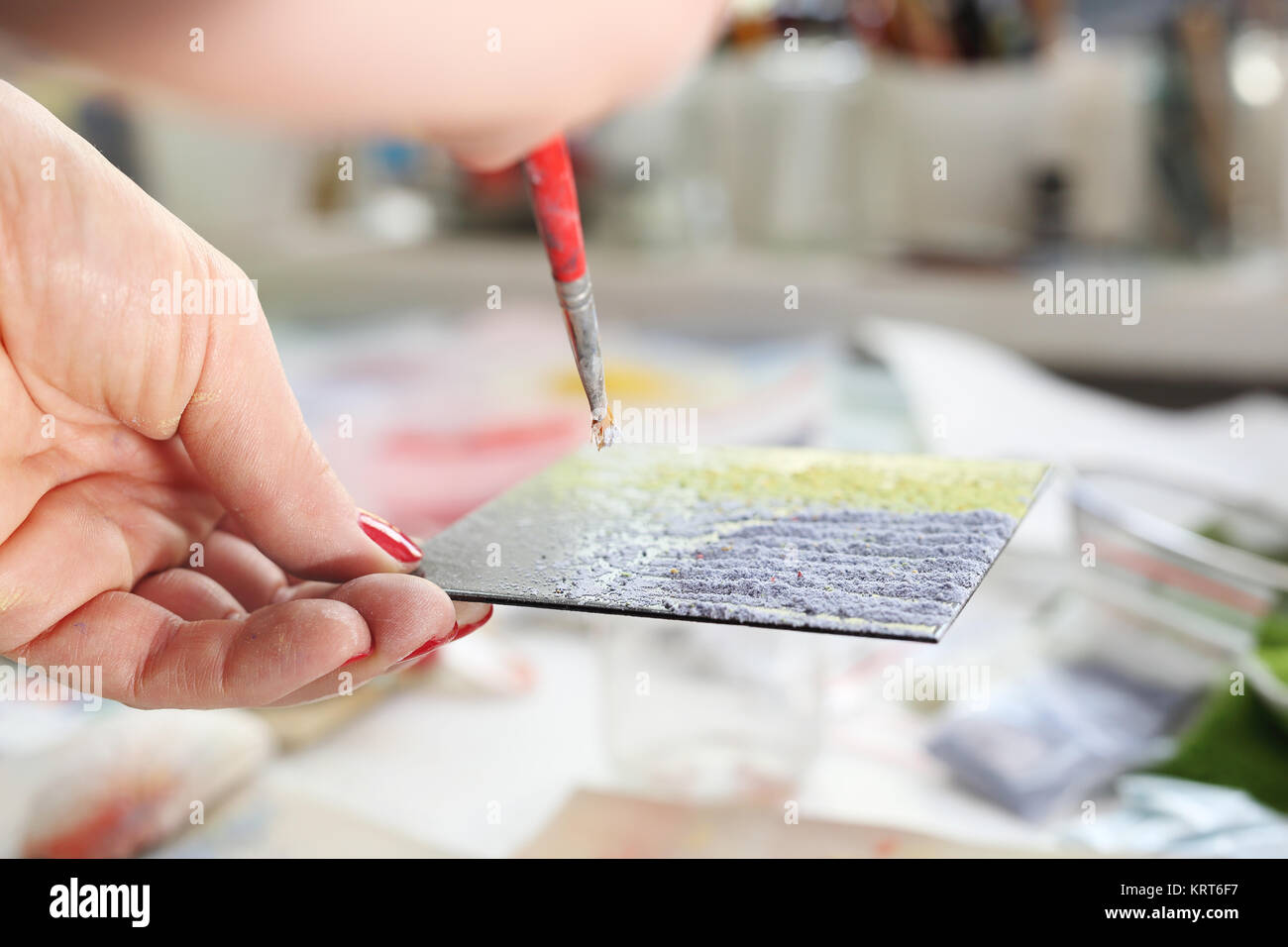 painting tiles. hand decorated ceramic tiles Stock Photo - Alamy