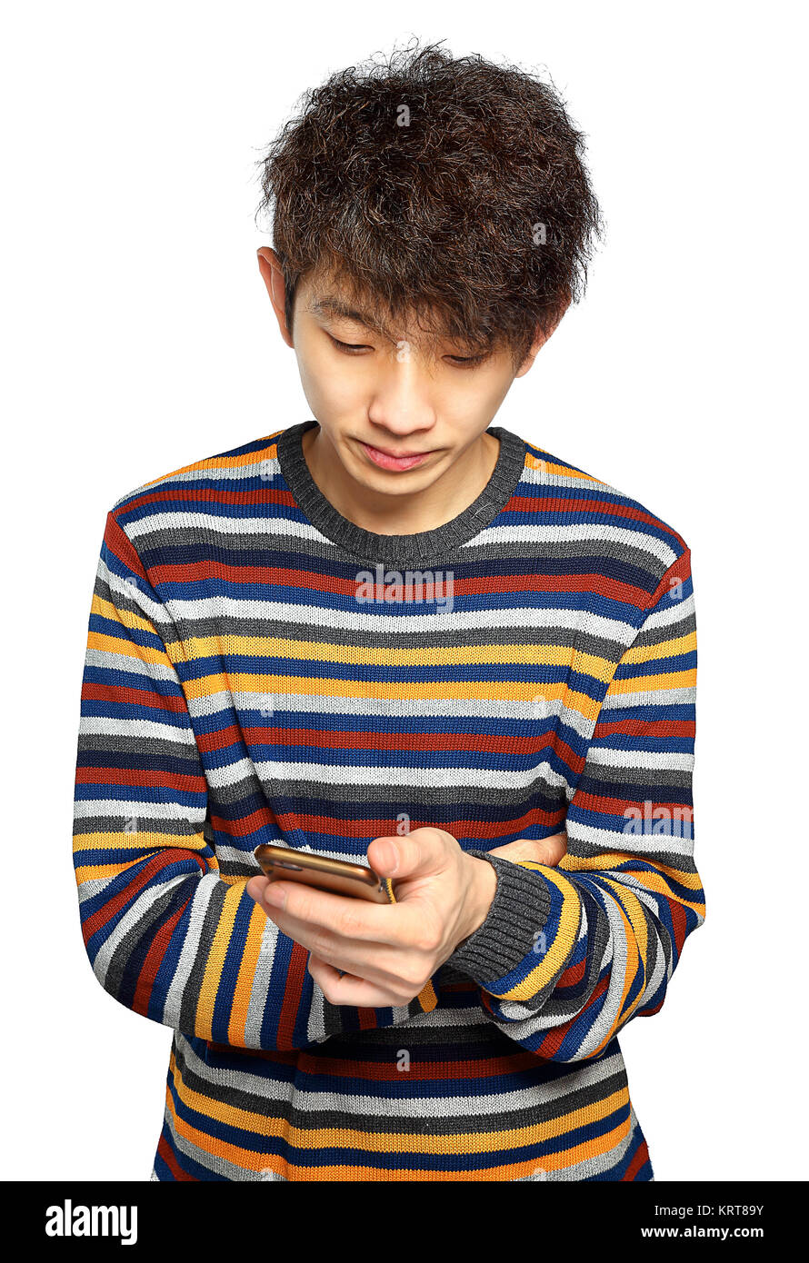 Young man using mobile phone texting Stock Photo - Alamy