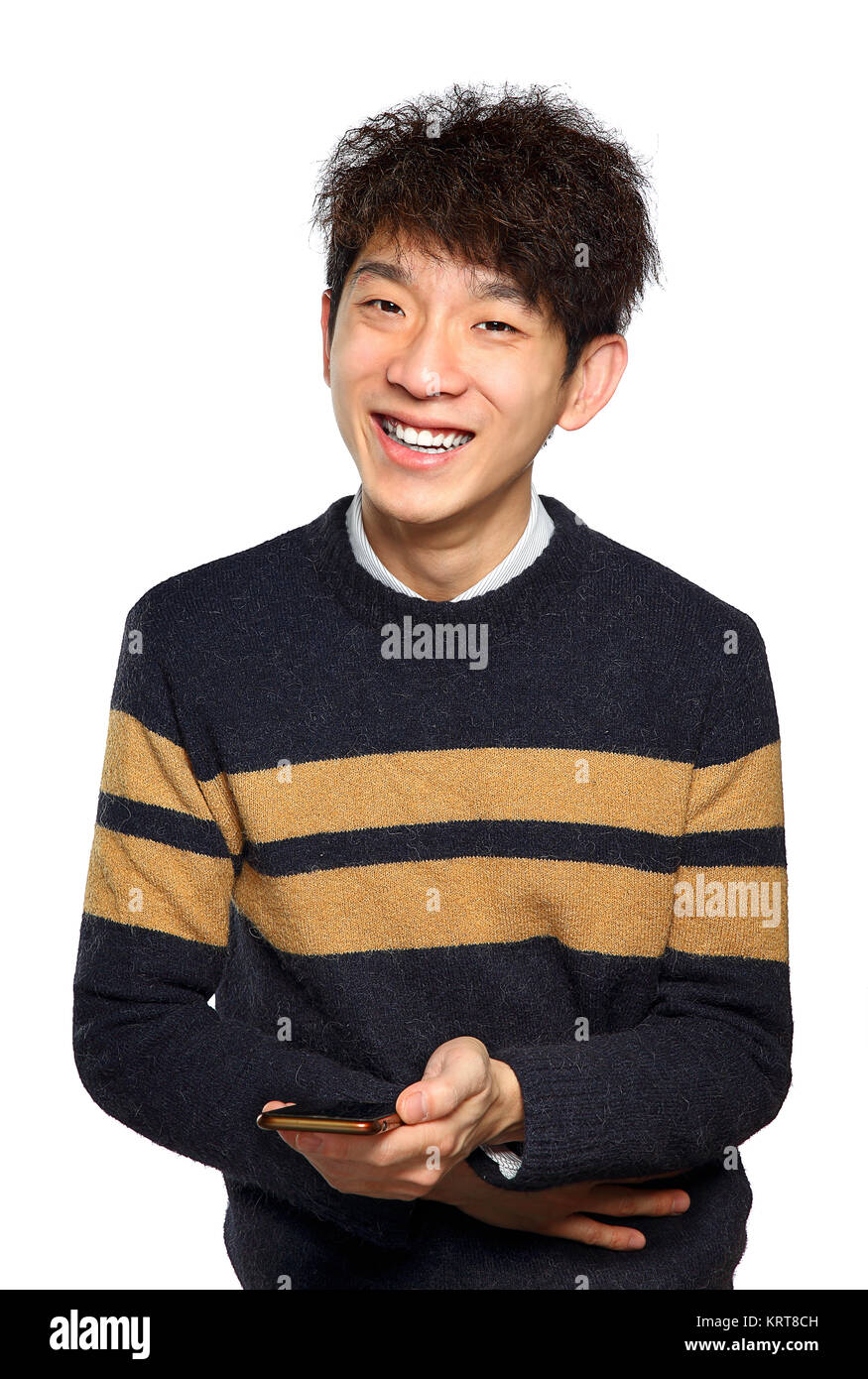 Young man using mobile phone texting Stock Photo - Alamy