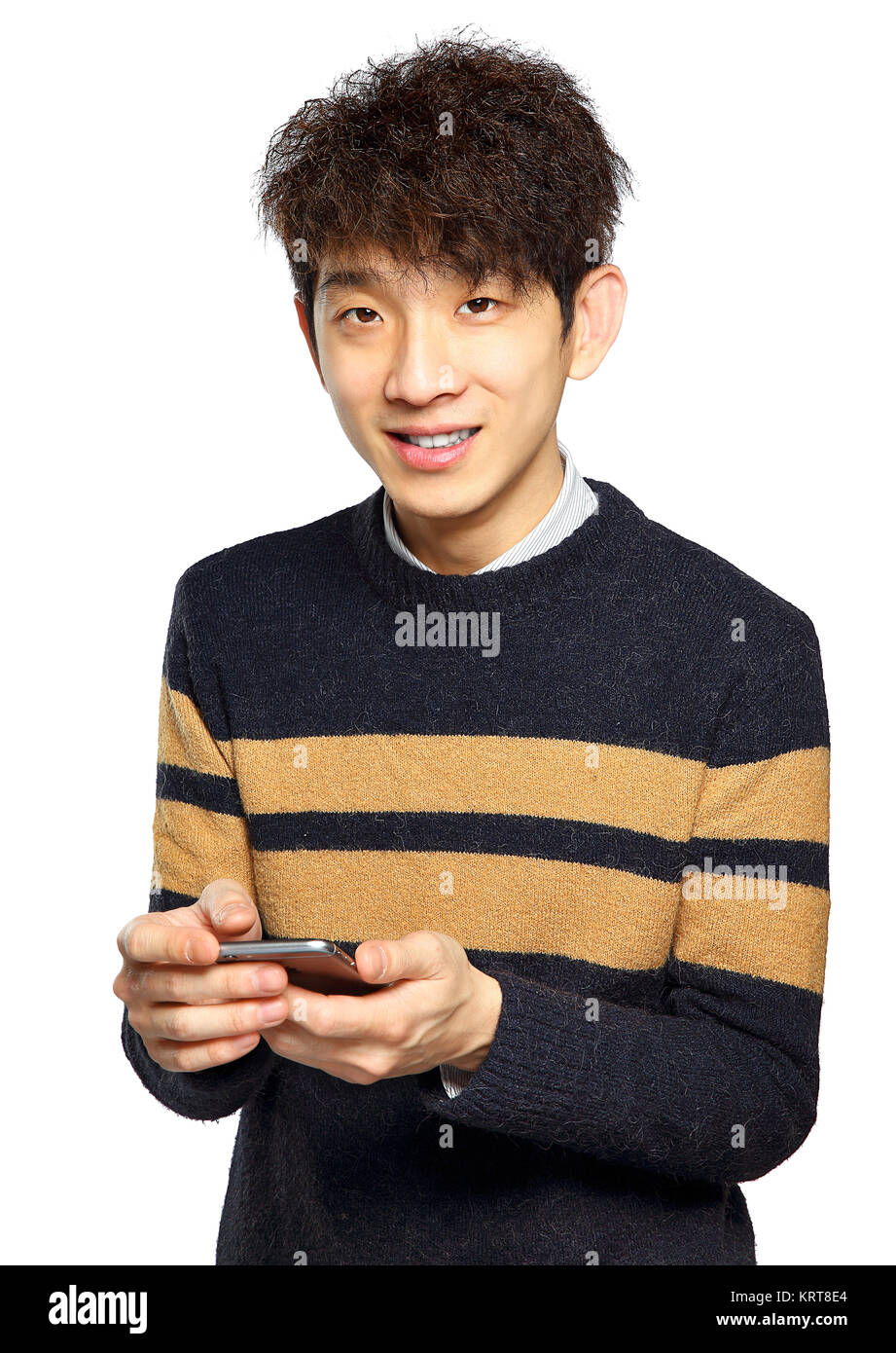 Young man using mobile phone on white background Stock Photo - Alamy