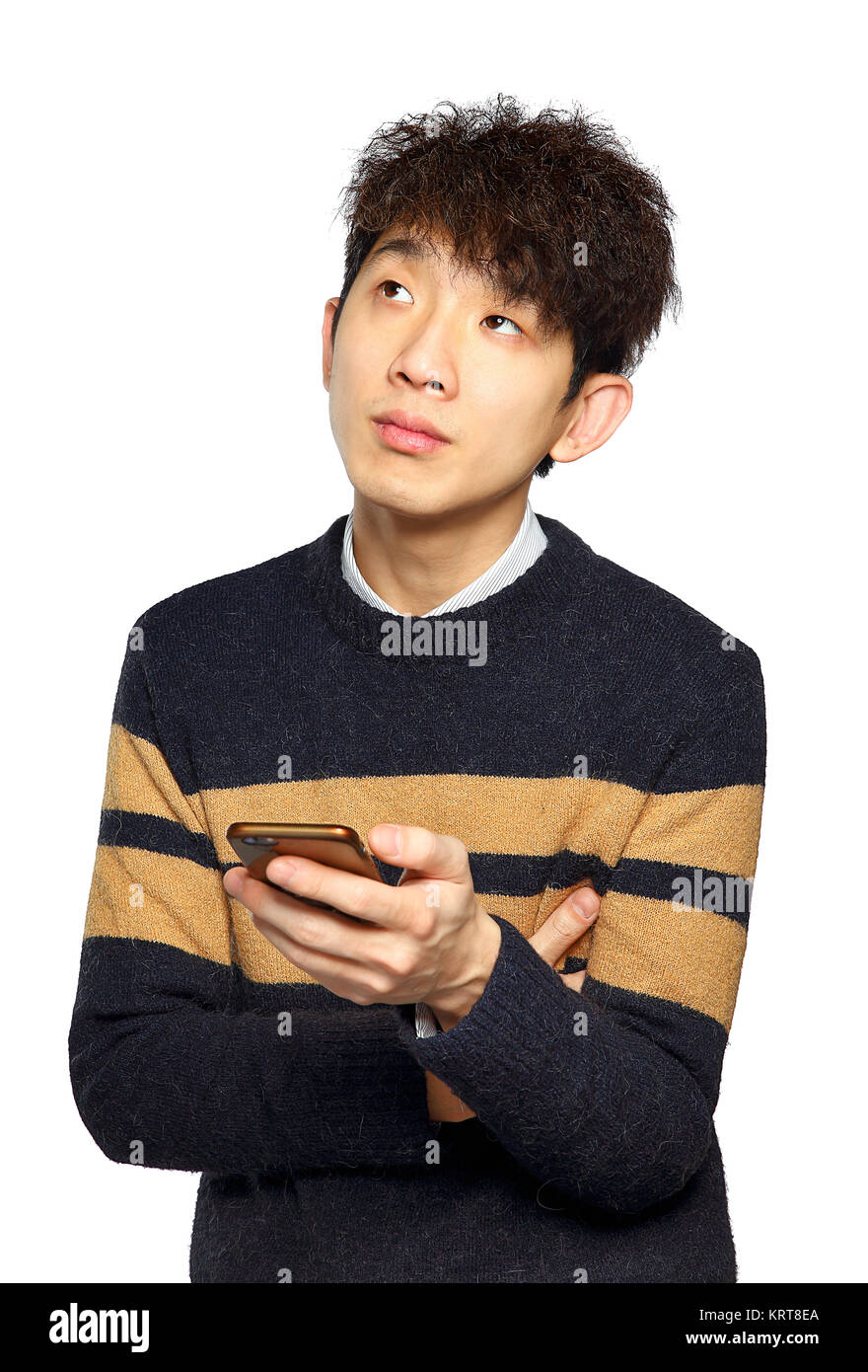 young asia man texting on mobilephone Stock Photo - Alamy
