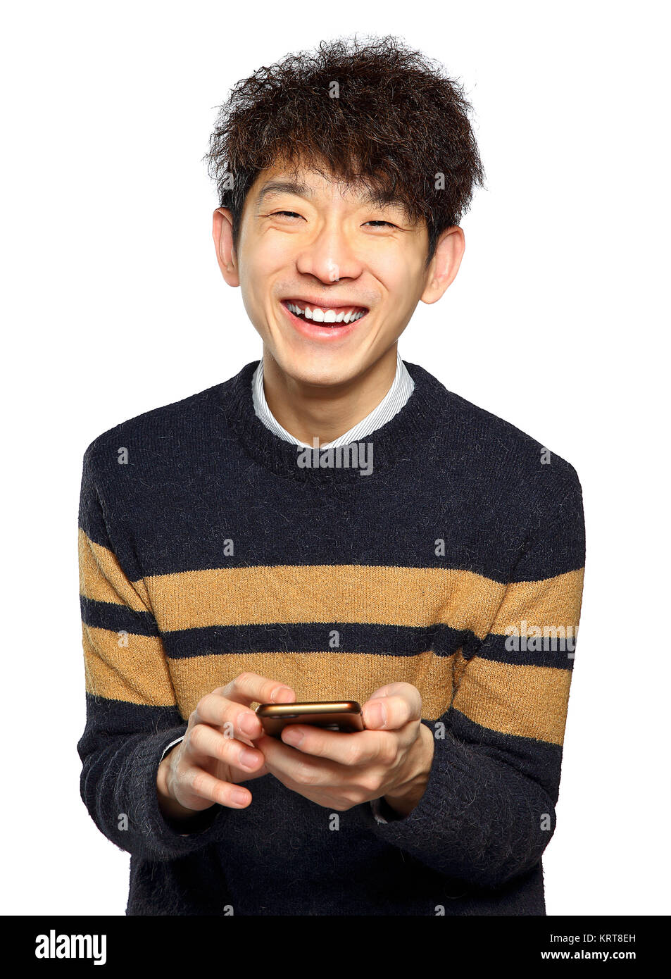 Young man using mobile phone texting Stock Photo - Alamy