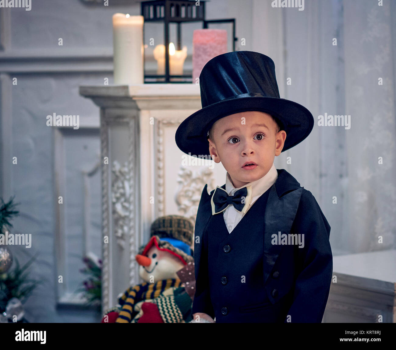 child magician with magic wand and hat Stock Photo - Alamy