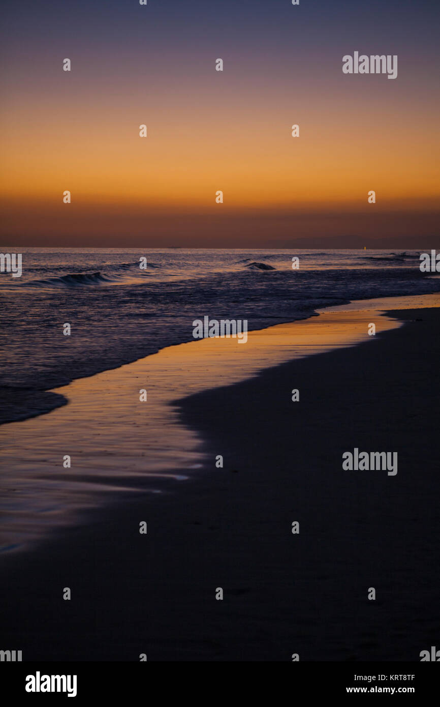 Beautiful sunset on the beach in Salalah, Oman Stock Photo - Alamy