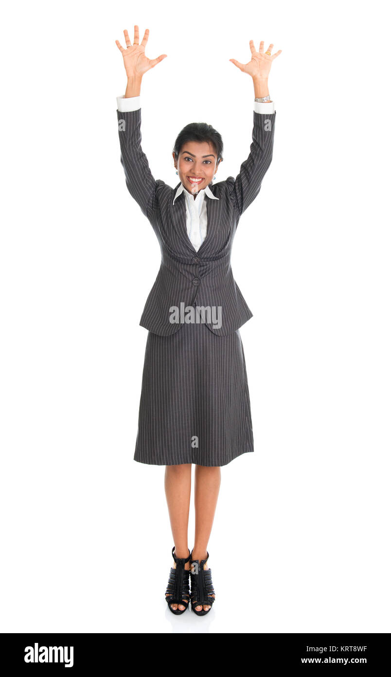Indian business woman arms raised Stock Photo - Alamy