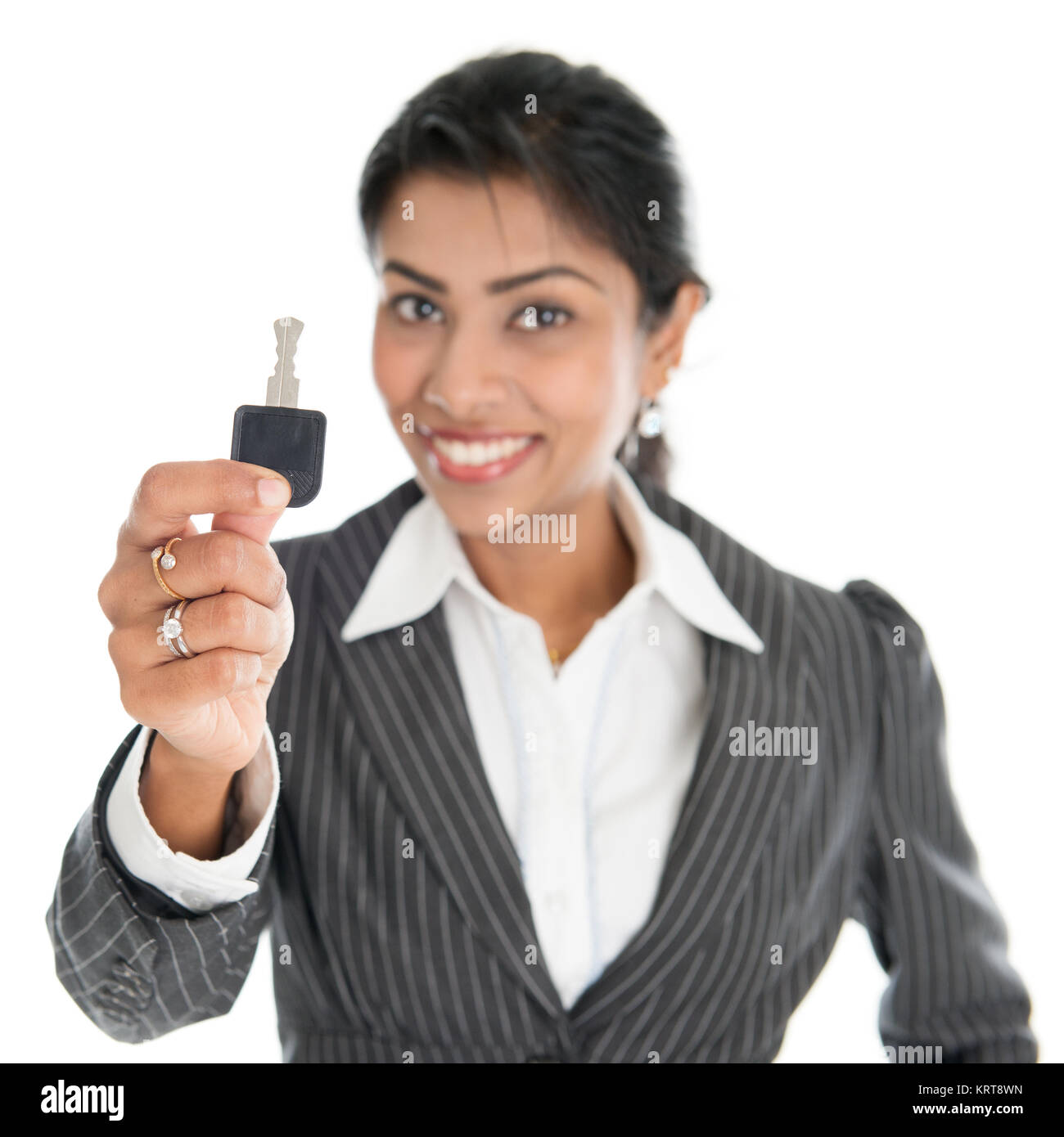 Woman hand holding key Stock Photo - Alamy