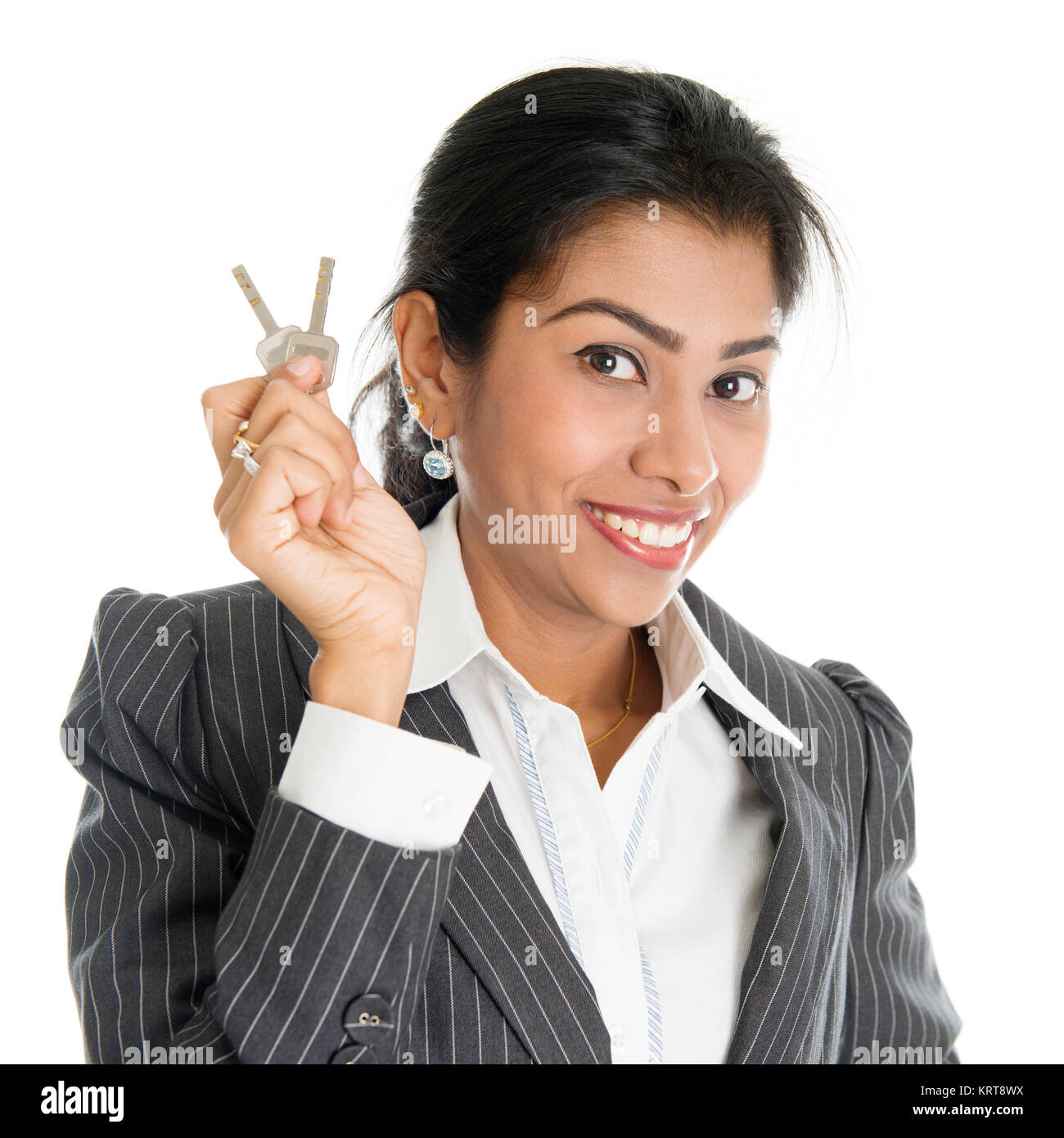 Woman with house key Stock Photo - Alamy