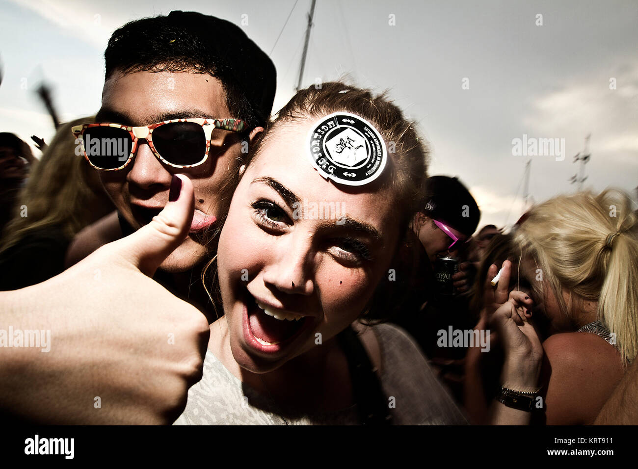 Party people is having a crazy good time with beer, music and dancing ...