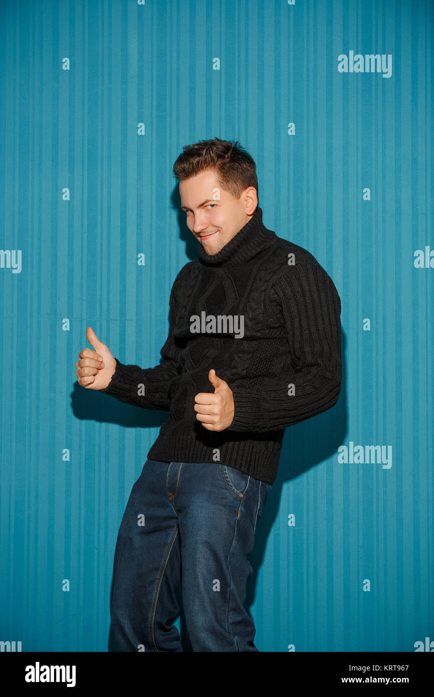 Portrait of young man with serious facial expression Stock Photo - Alamy