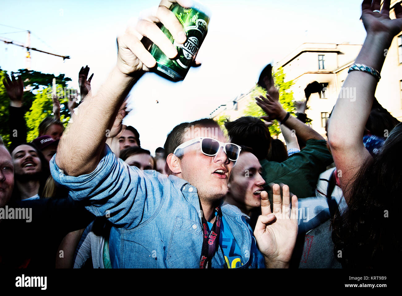 Party people are dancing and drinking at the annual street and block ...