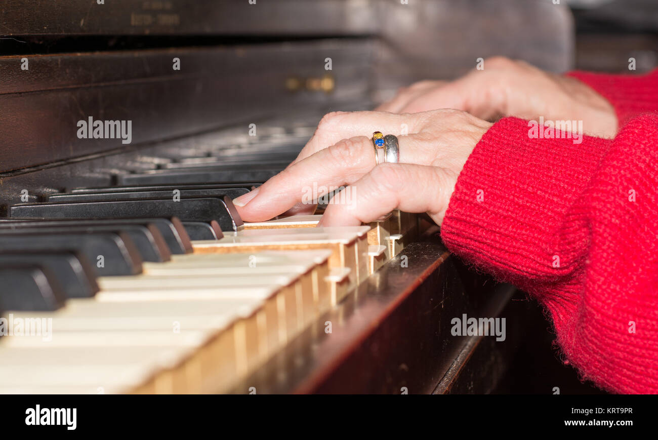 Hands playing classical piano hi-res stock photography and images - Alamy