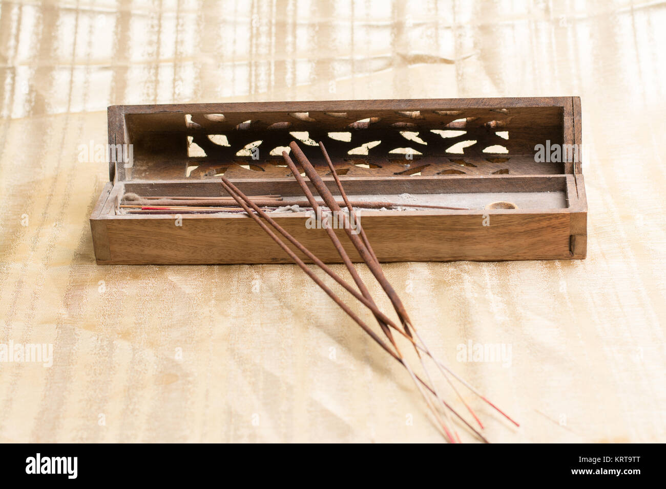 ornate incense box with incense sticks open Stock Photo - Alamy