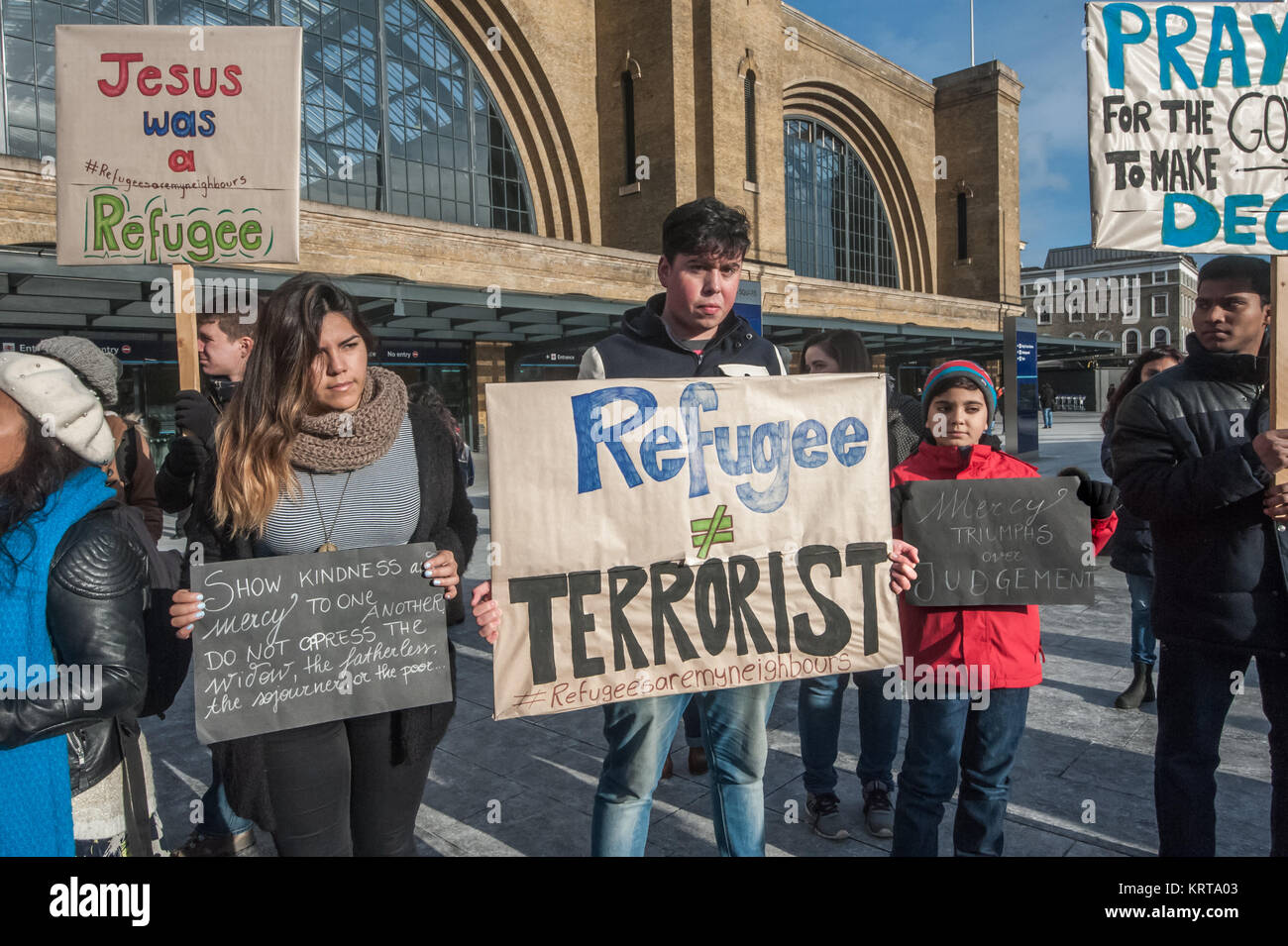 'Jesus was a Refugee' was one of the placards held by Christians taking ...