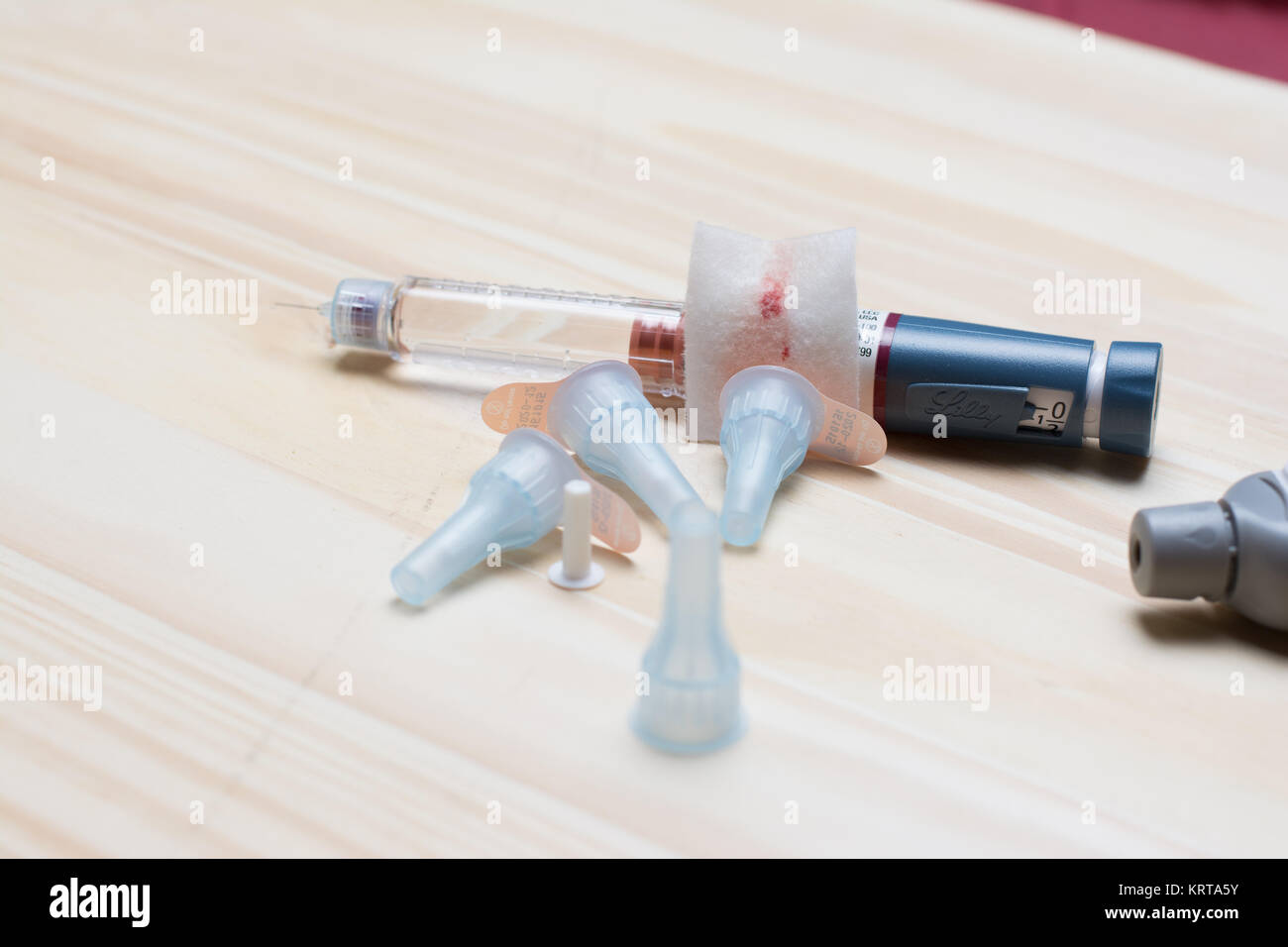 diabetic insulin pen with needles and wood background Stock Photo - Alamy