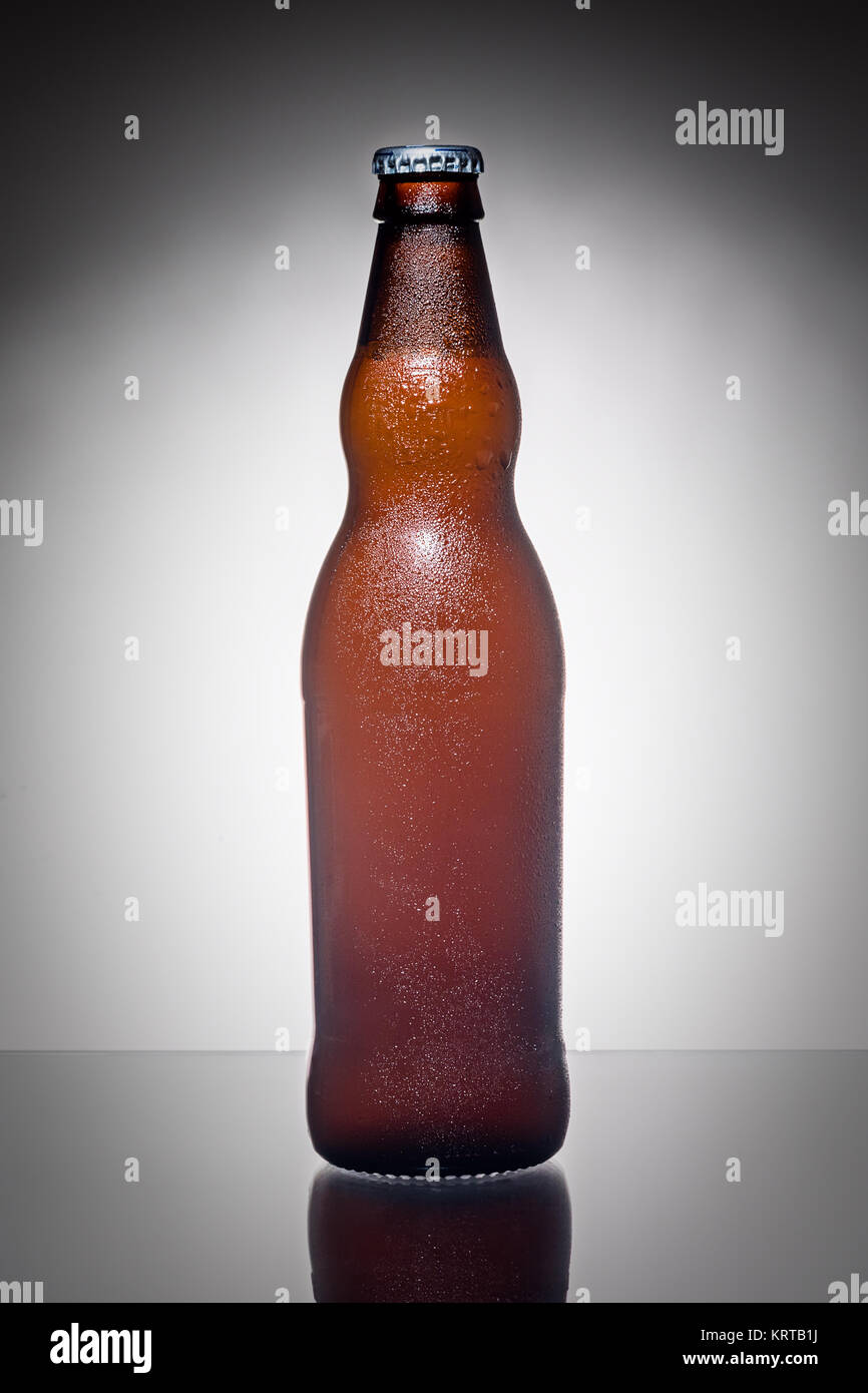 Bottle of beer empty full condensate cold refreshing Still life on gold ...
