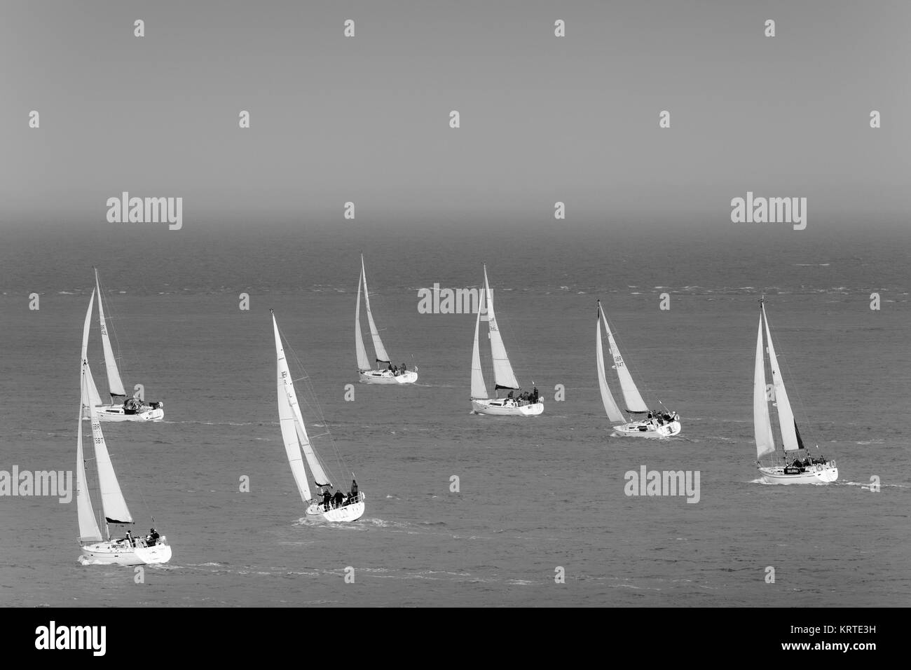 Competitors pass Hurst lighthouse during the annual Round the Island ...