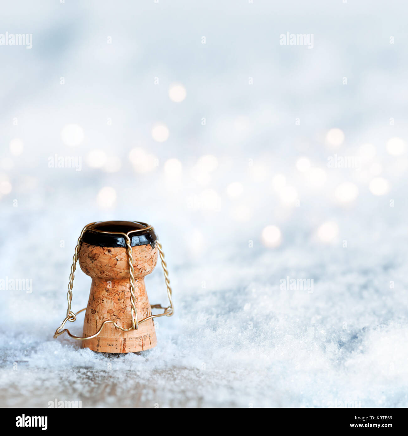 Champagne cork with bokeh in the snow for congratulations Stock Photo ...
