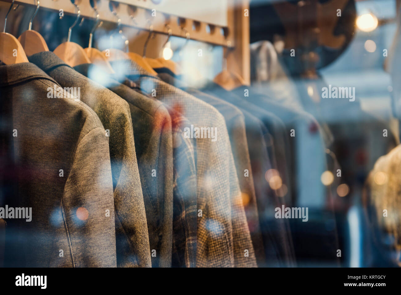 fancy clothing in a boutique, view form outside Stock Photo - Alamy