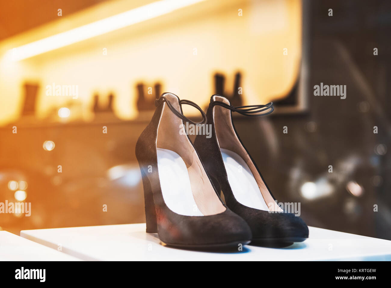 Luxury shoes in a showcase of a store Stock Photo - Alamy