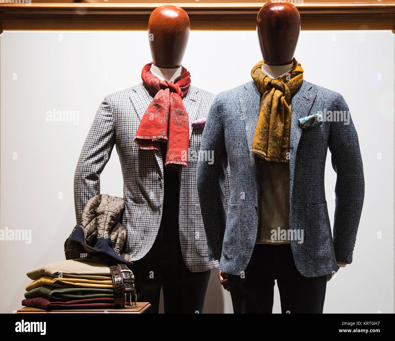 Elegant men clothing in a fashion store Stock Photo - Alamy