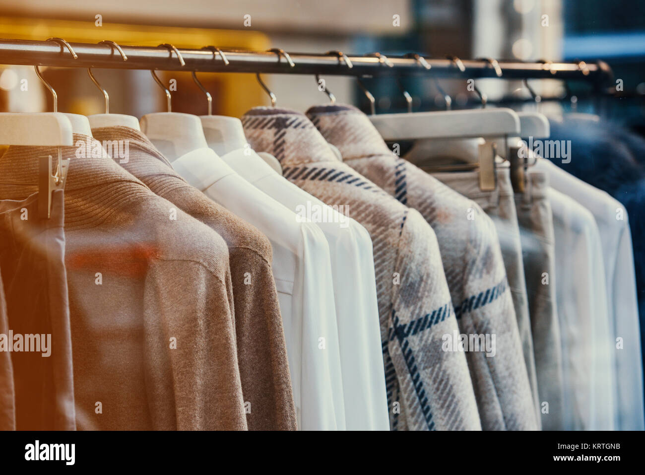 Men clothing on a rack - closeup photo Stock Photo - Alamy