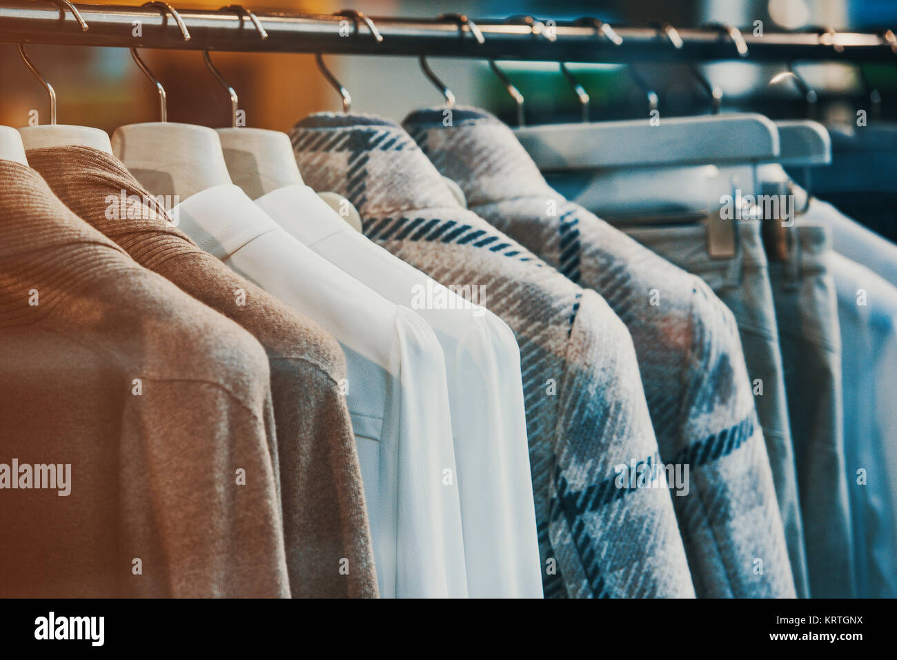 Men clothing on a rack - closeup photo Stock Photo - Alamy