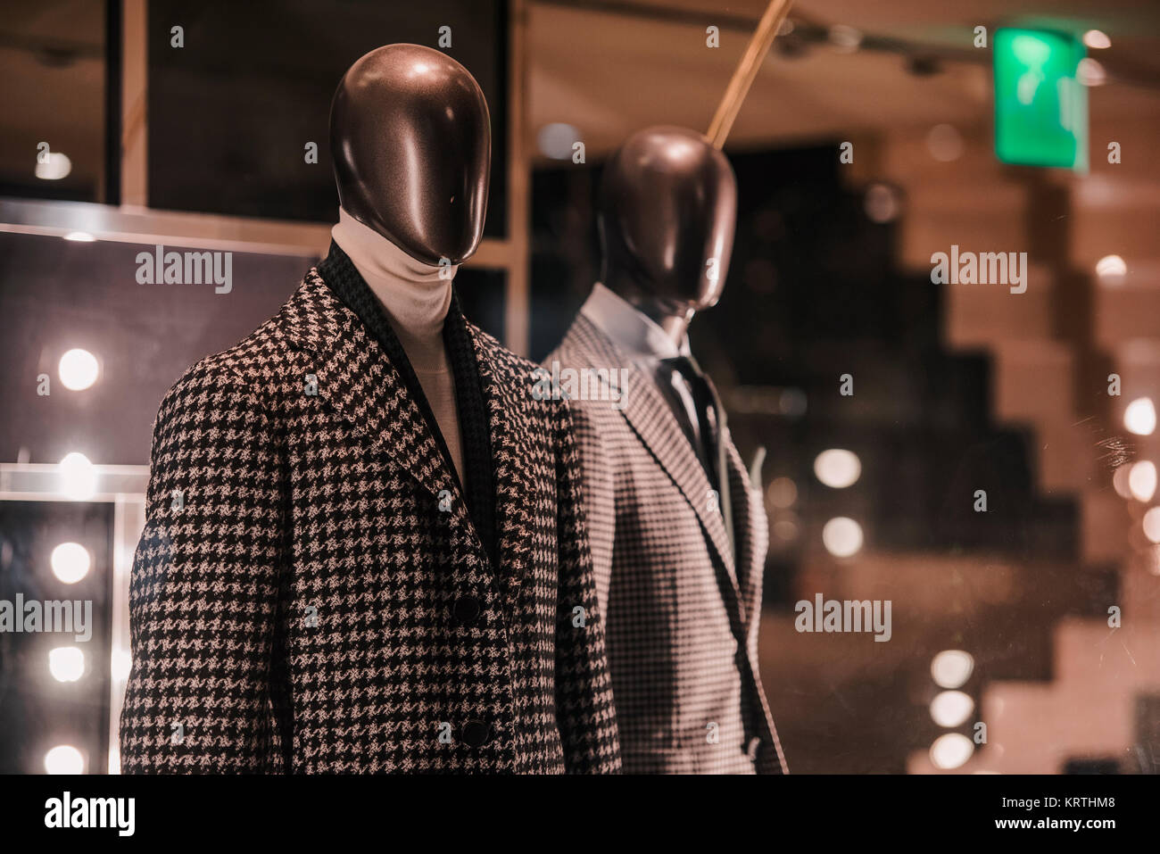 Suit in a showcase of a luxury store Stock Photo - Alamy