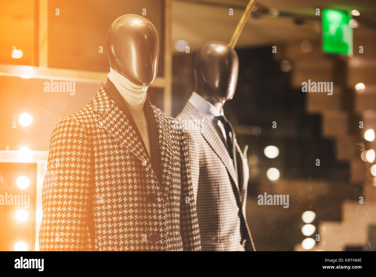 Suit in a showcase of a luxury store Stock Photo - Alamy