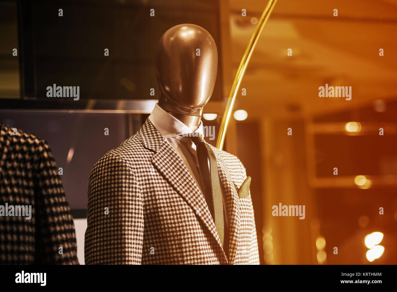 Suit in a showcase of a luxury store Stock Photo - Alamy