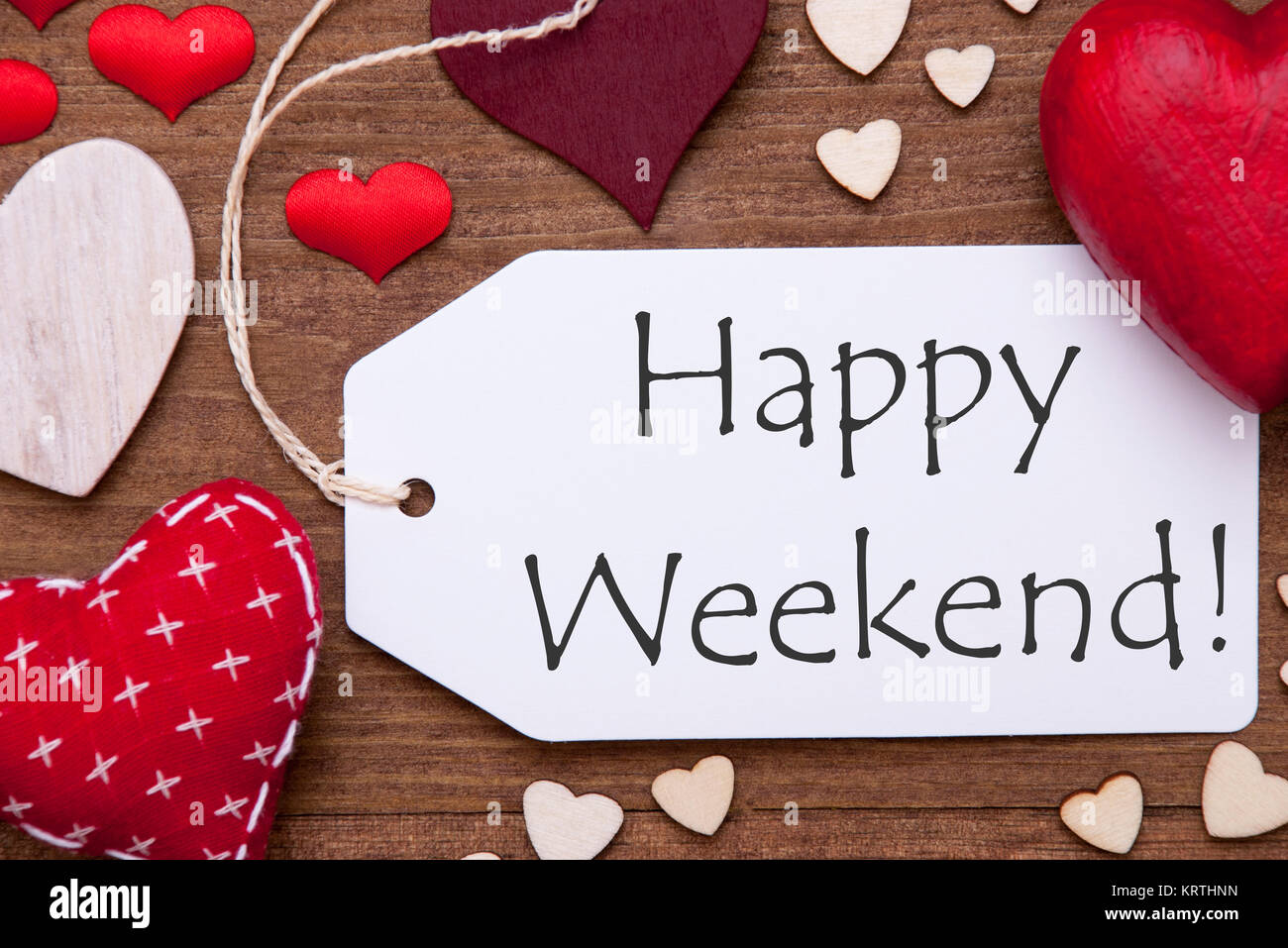 Label With English Text Happy Weekend. Red Textile Hearts On Wooden ...