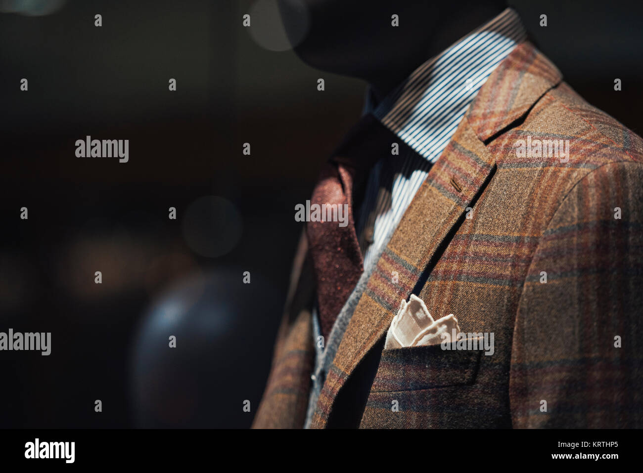 Suit in a showcase of a luxury store Stock Photo - Alamy