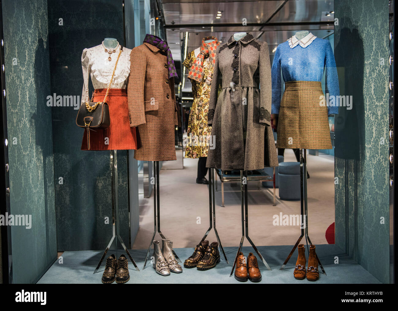 Beautiful clothing in a luxury store window Stock Photo - Alamy