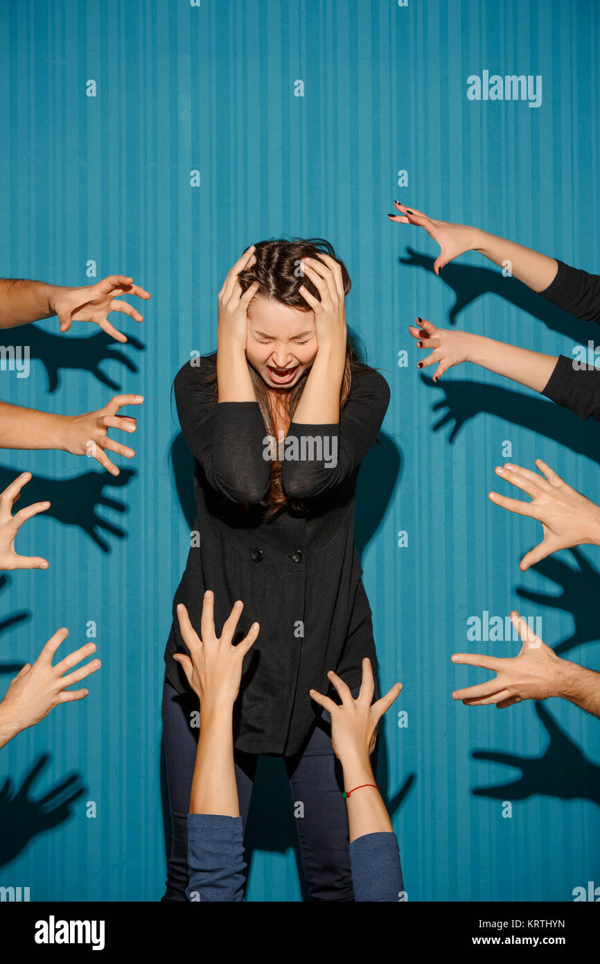 Portrait of young woman with shocked facial expression Stock Photo - Alamy