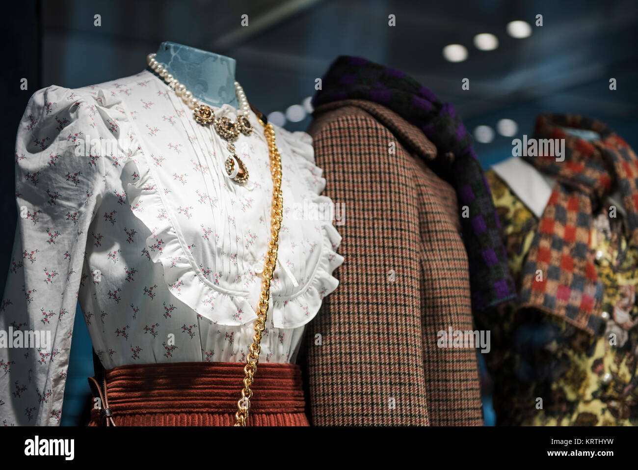 Beautiful clothing in a luxury store window Stock Photo - Alamy