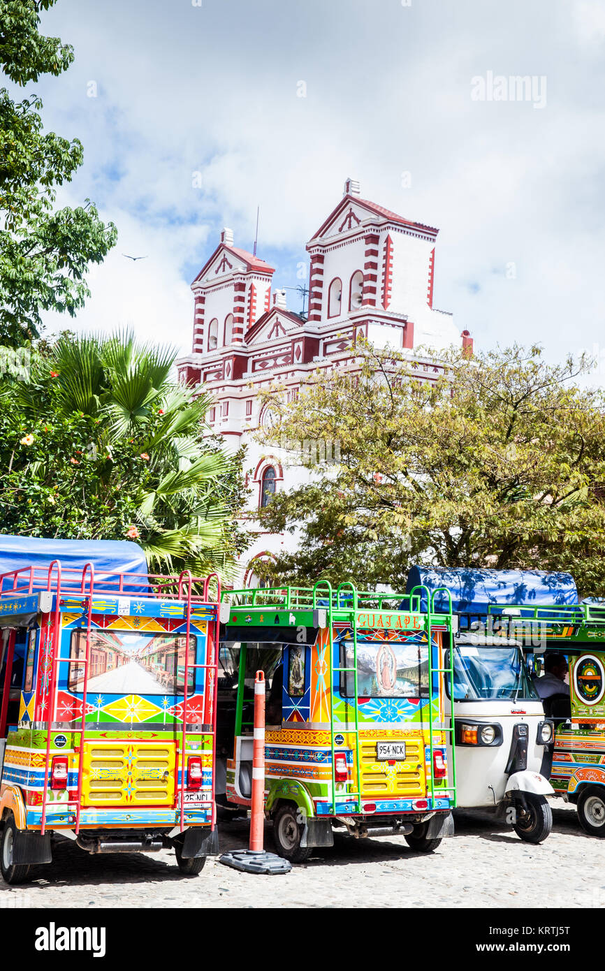Motor-tricycles decorated as traditional Colombian chivas at the ...