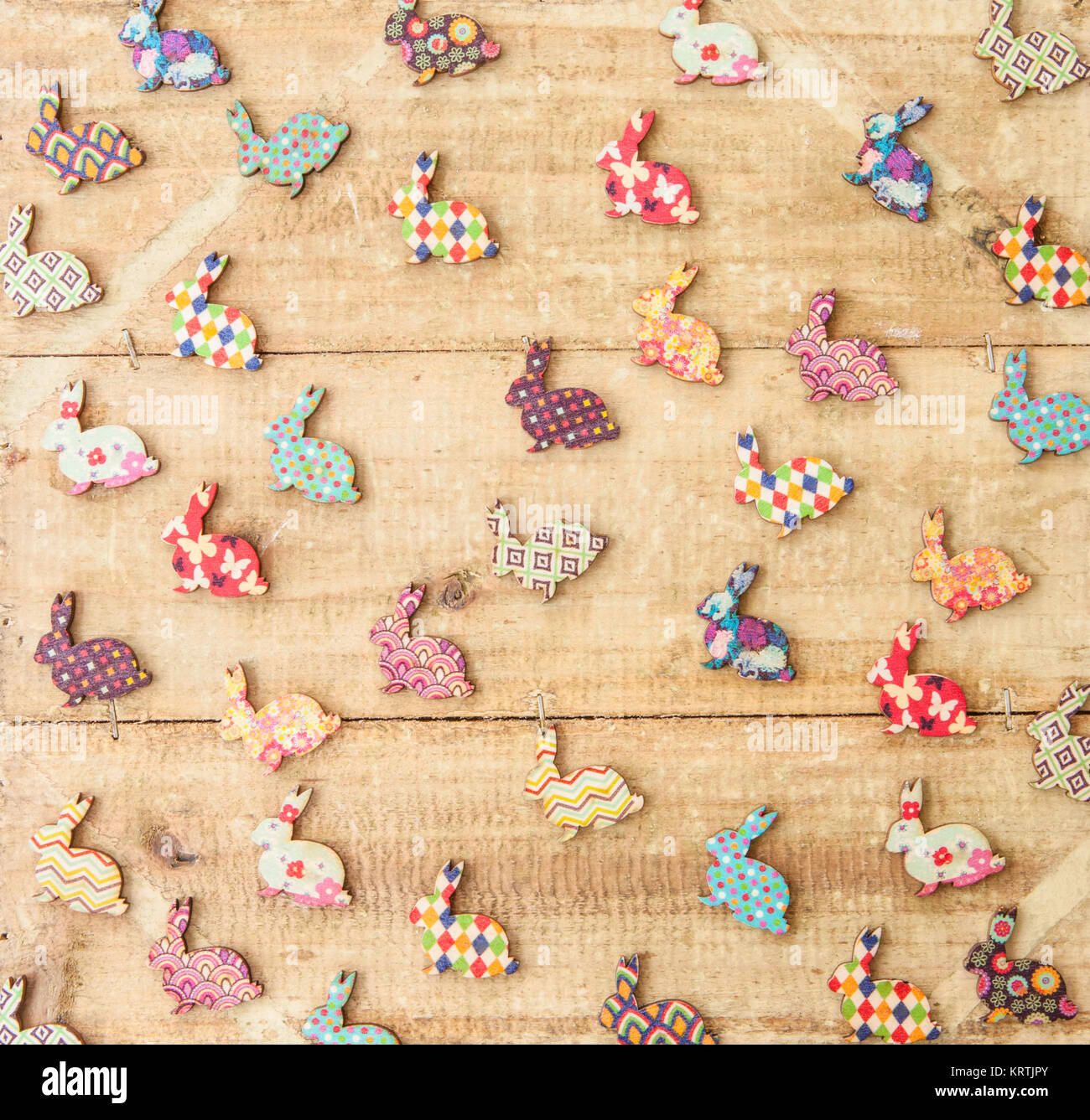 colorful haeschen on wood Stock Photo - Alamy