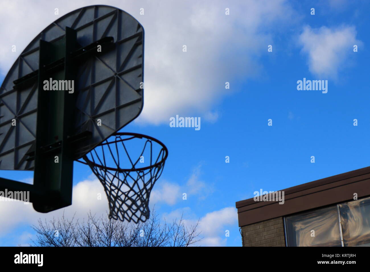 Blue Skied Basketball Hoop Stock Photo - Alamy