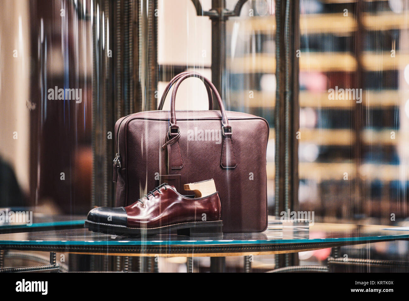 Luxury showcase - shoes and men handbag Stock Photo - Alamy
