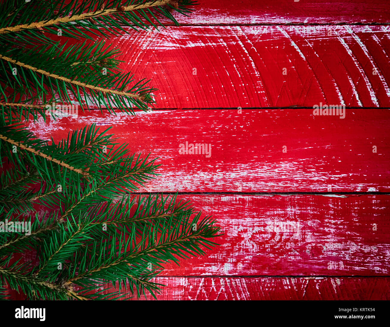 Vintage red wood background with branch fir Stock Photo - Alamy