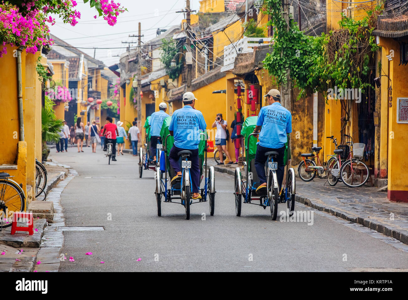 Royalty high quality free stock image of cyclo driver cycling on a ...