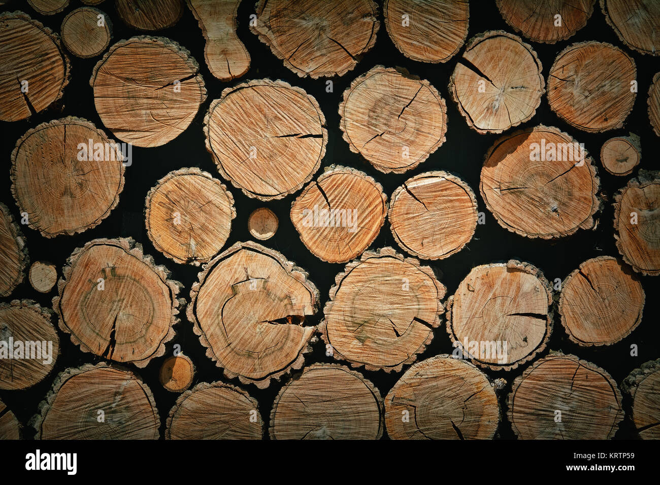 Stacked Logs Background Stock Photo - Alamy
