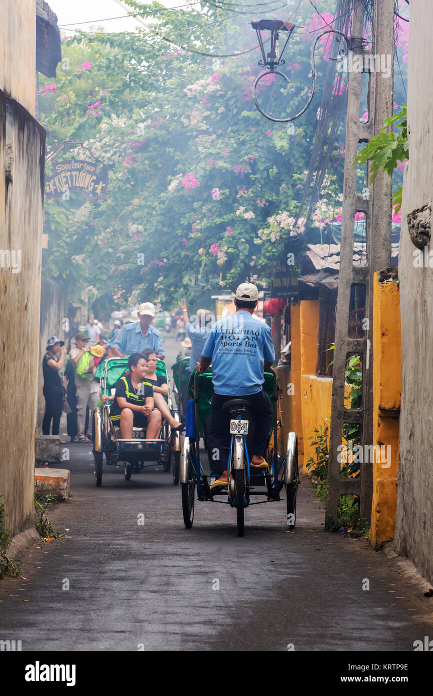 Royalty high quality free stock image of cyclo driver cycling on a ...