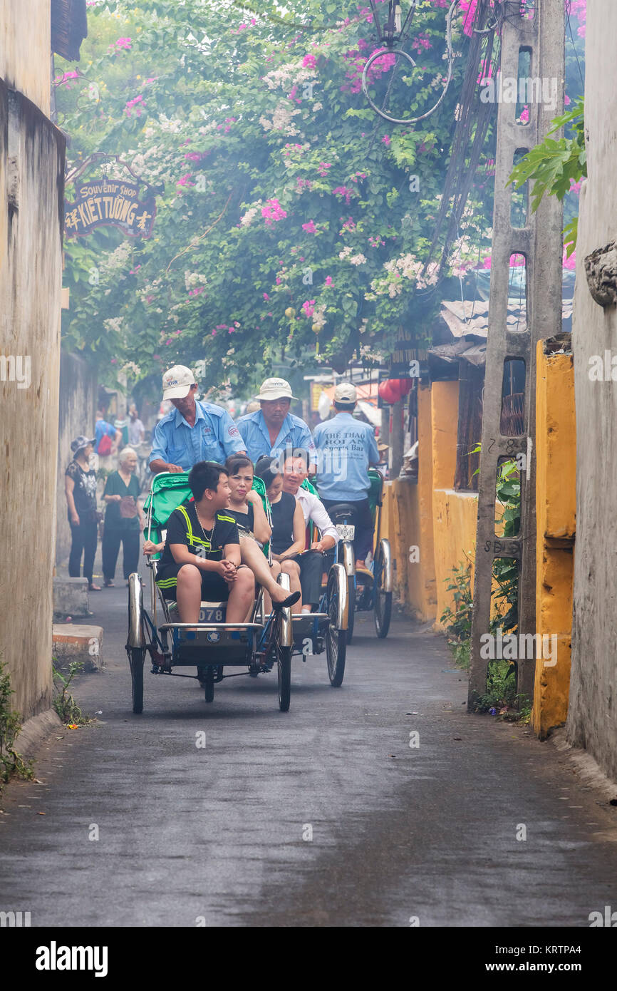 Royalty high quality free stock image of cyclo driver cycling on a ...
