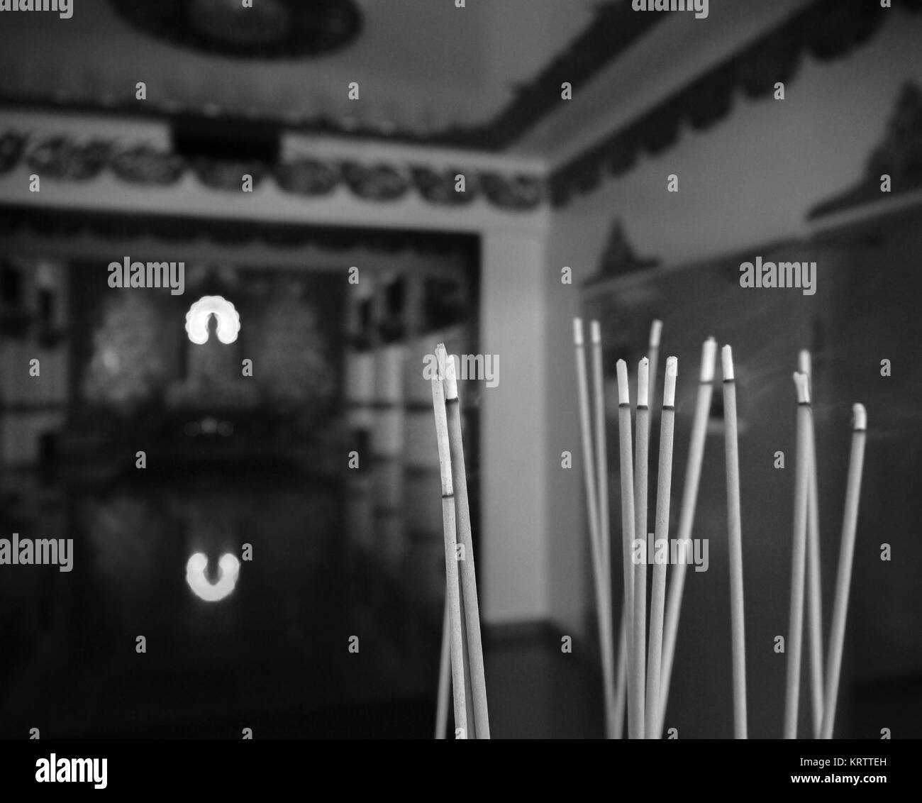 Traditional incense sticks burning Black and White Stock Photos ...